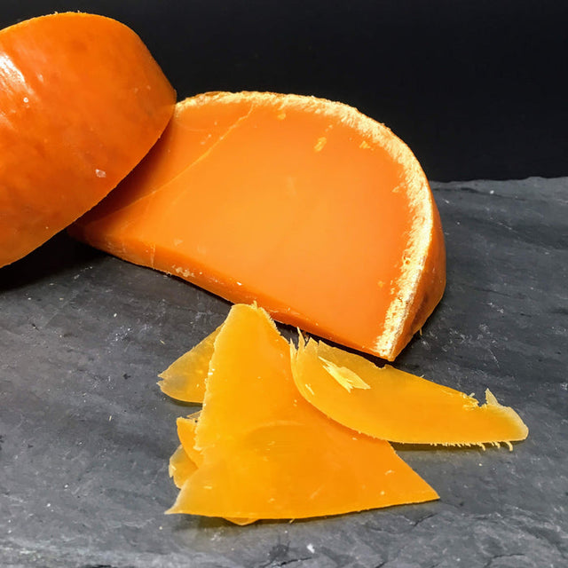 Mimolette, cow's milk, Normandy, France - 0.5lb/Cut – PERRINE's WINE SHOP